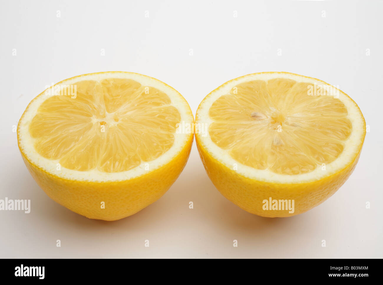 Lemon cut in half hi-res stock photography and images - Alamy