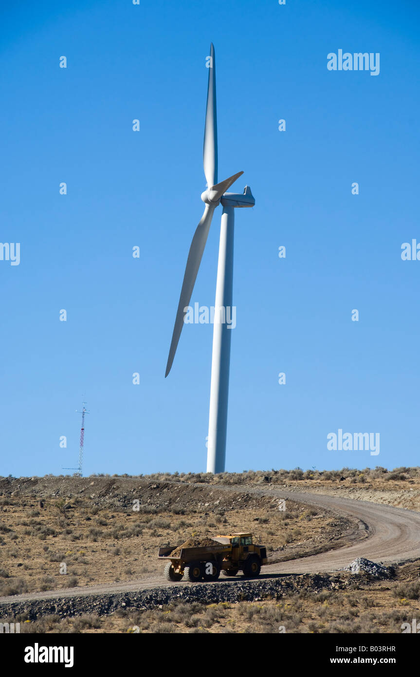 Dump truck beneath wind turbines in the desert Stock Photo - Alamy