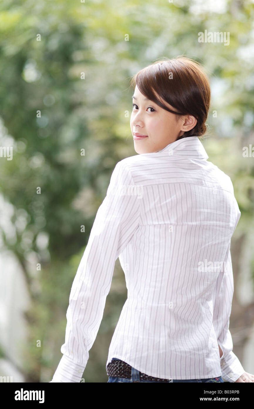 Woman turning back time hi-res stock photography and images - Alamy