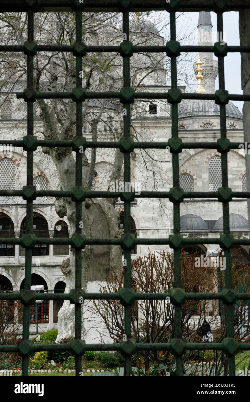 The Blue Mosque seen through a window grille in the northeast perimeter ...