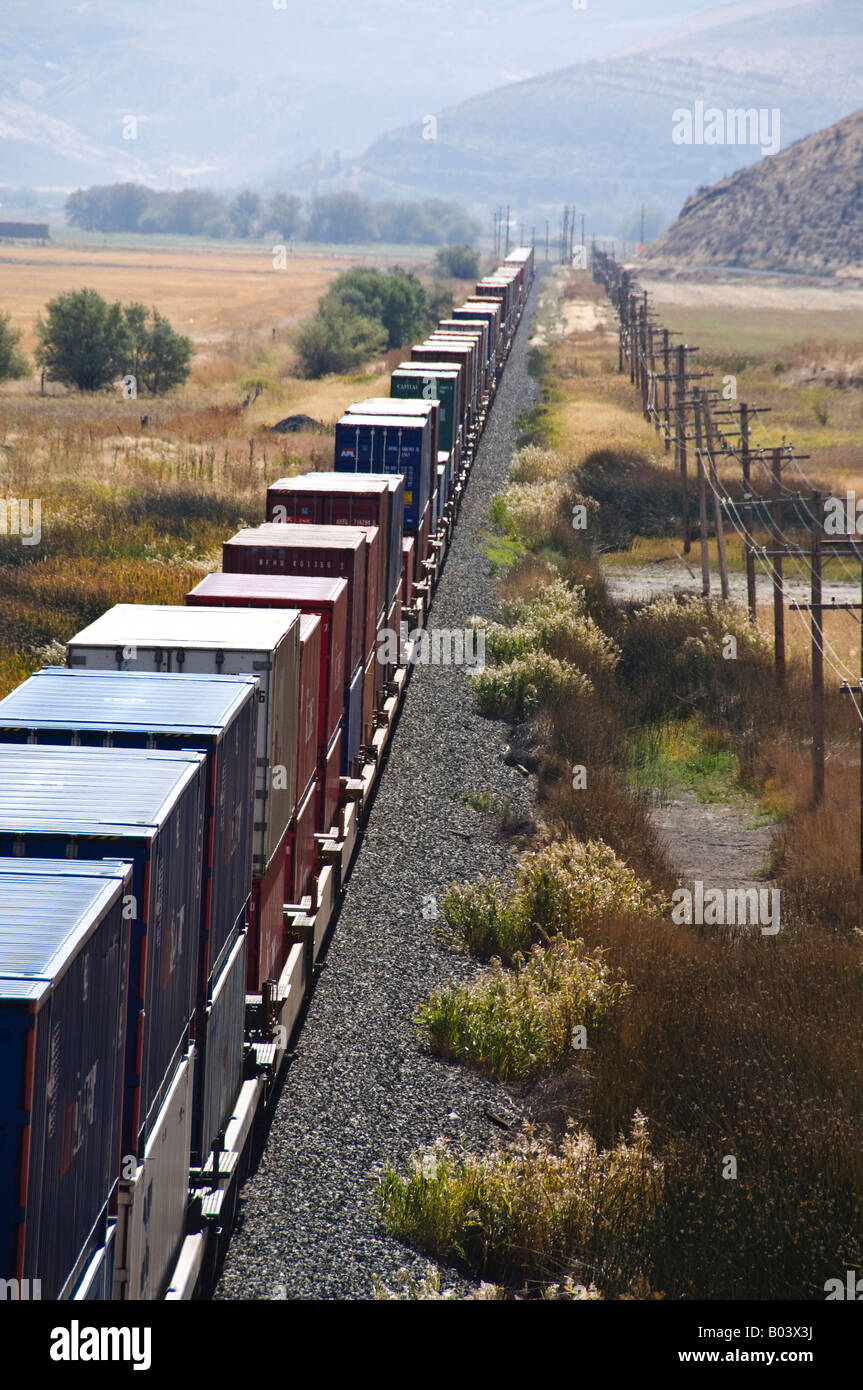 Freight train in the desert mountains Stock Photo - Alamy
