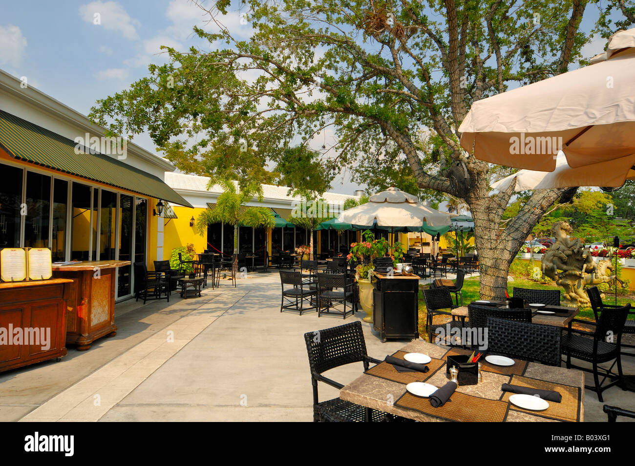 coffee bar restaurant shop with table chairs umbrella parasol in ...