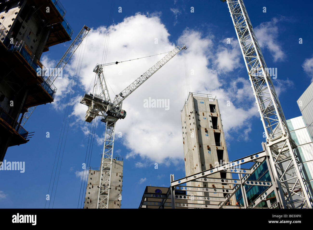 cranes on construction site Stock Photo - Alamy