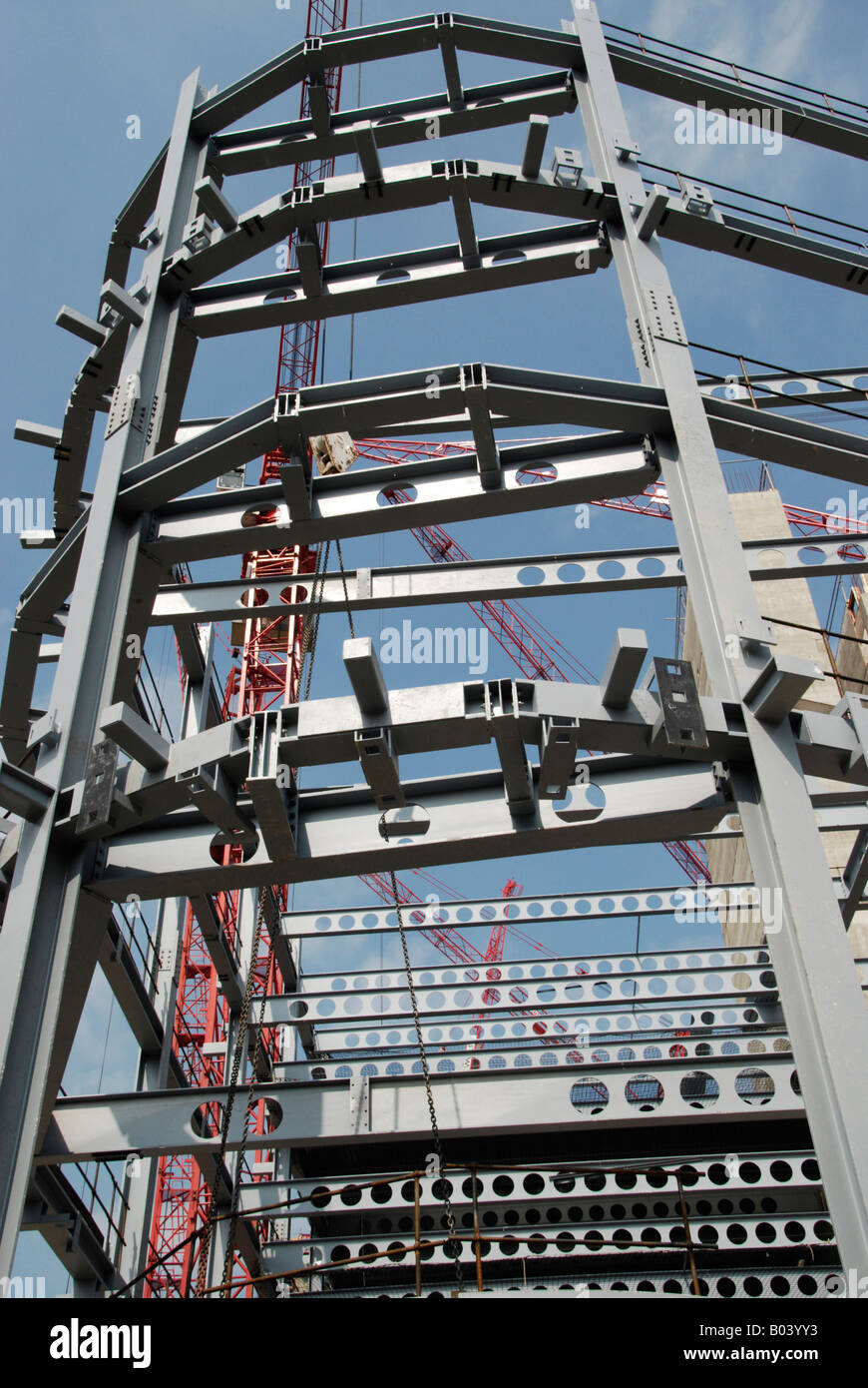 Iron girder building frame and cranes Stock Photo - Alamy