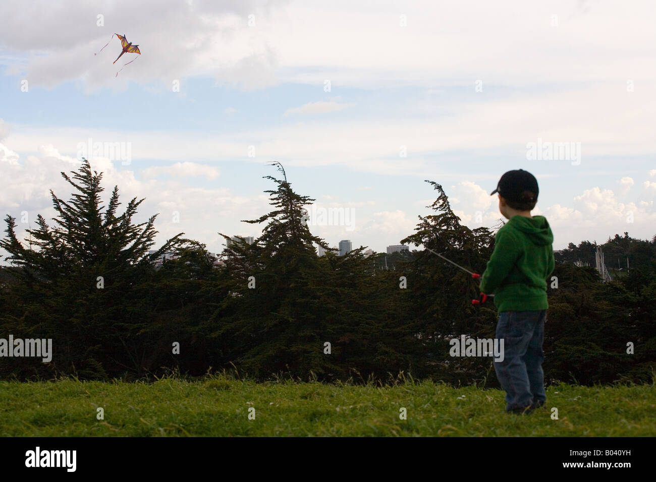 boy flying a kite Stock Photo - Alamy