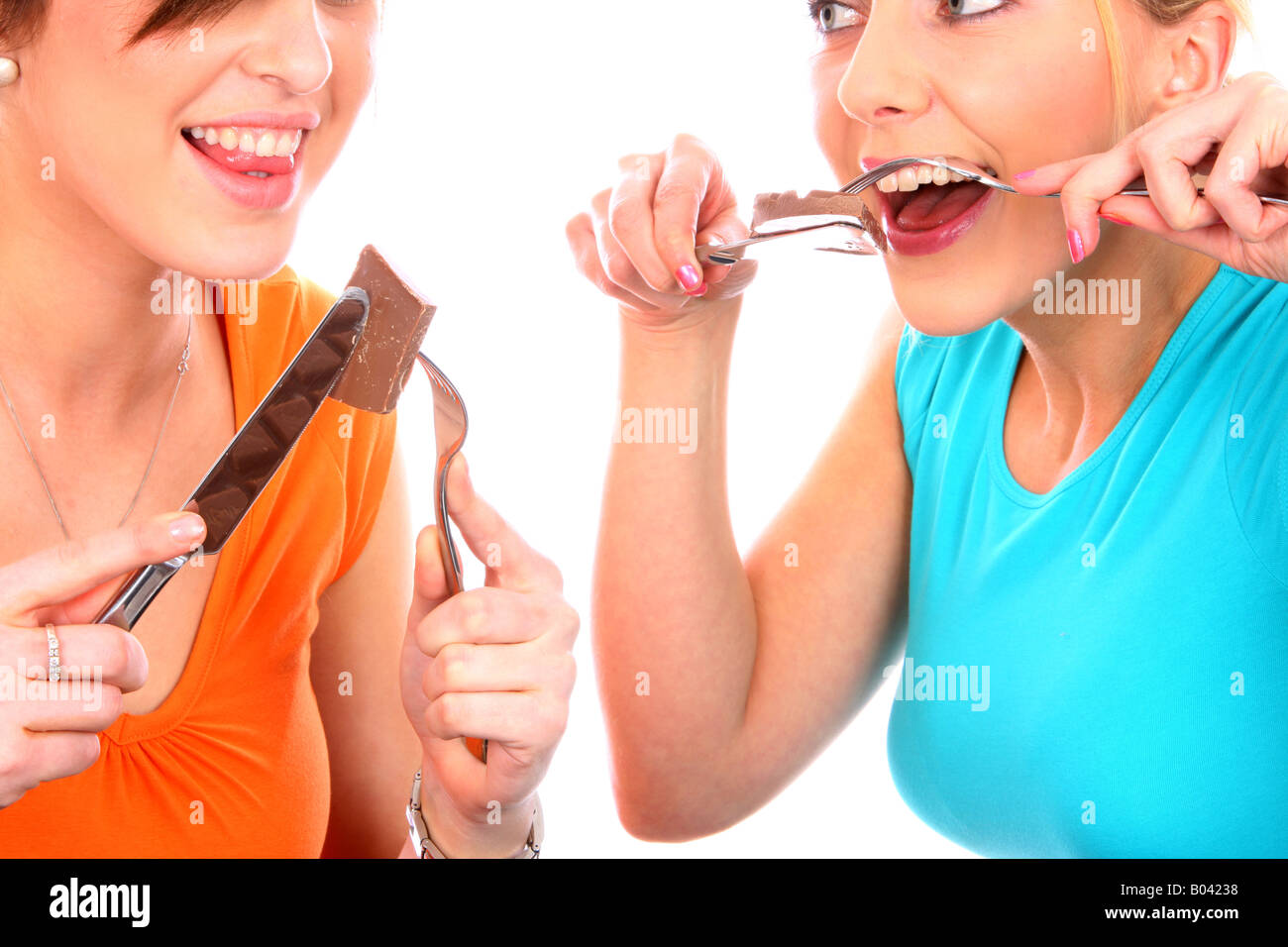 Young Women Eating Bar of Chocolate Model Released Stock Photo - Alamy