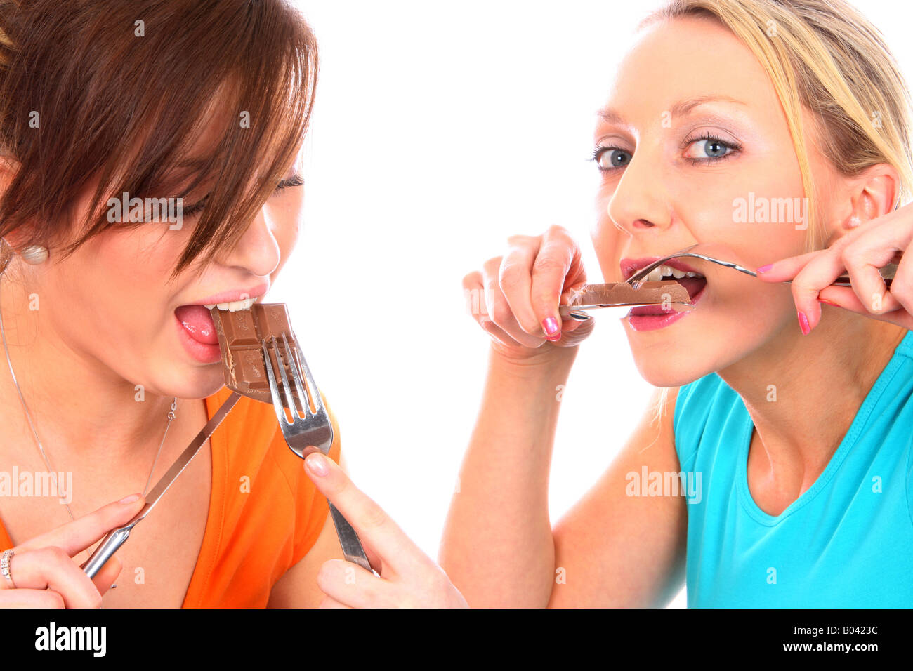 Young Women Eating Bar of Chocolate Model Released Stock Photo - Alamy