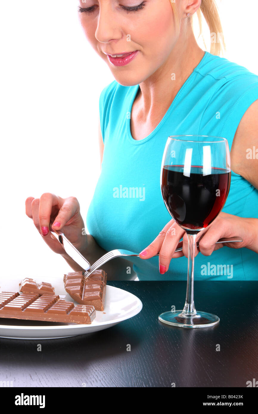 Young Woman Eating Chocolate Model Released Stock Photo - Alamy
