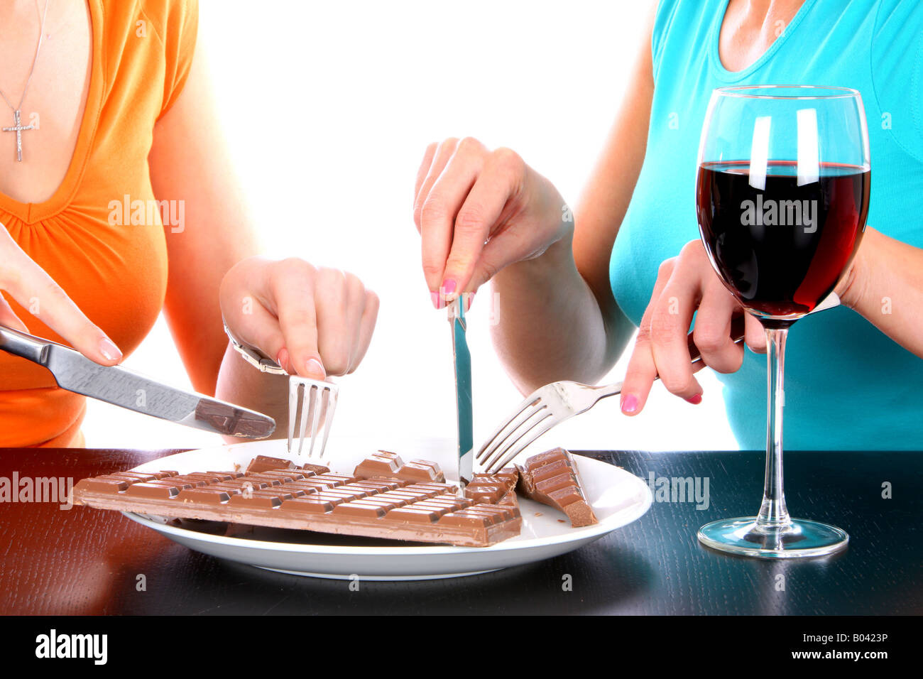 Young Women Eating Bar of Chocolate Model Released Stock Photo - Alamy