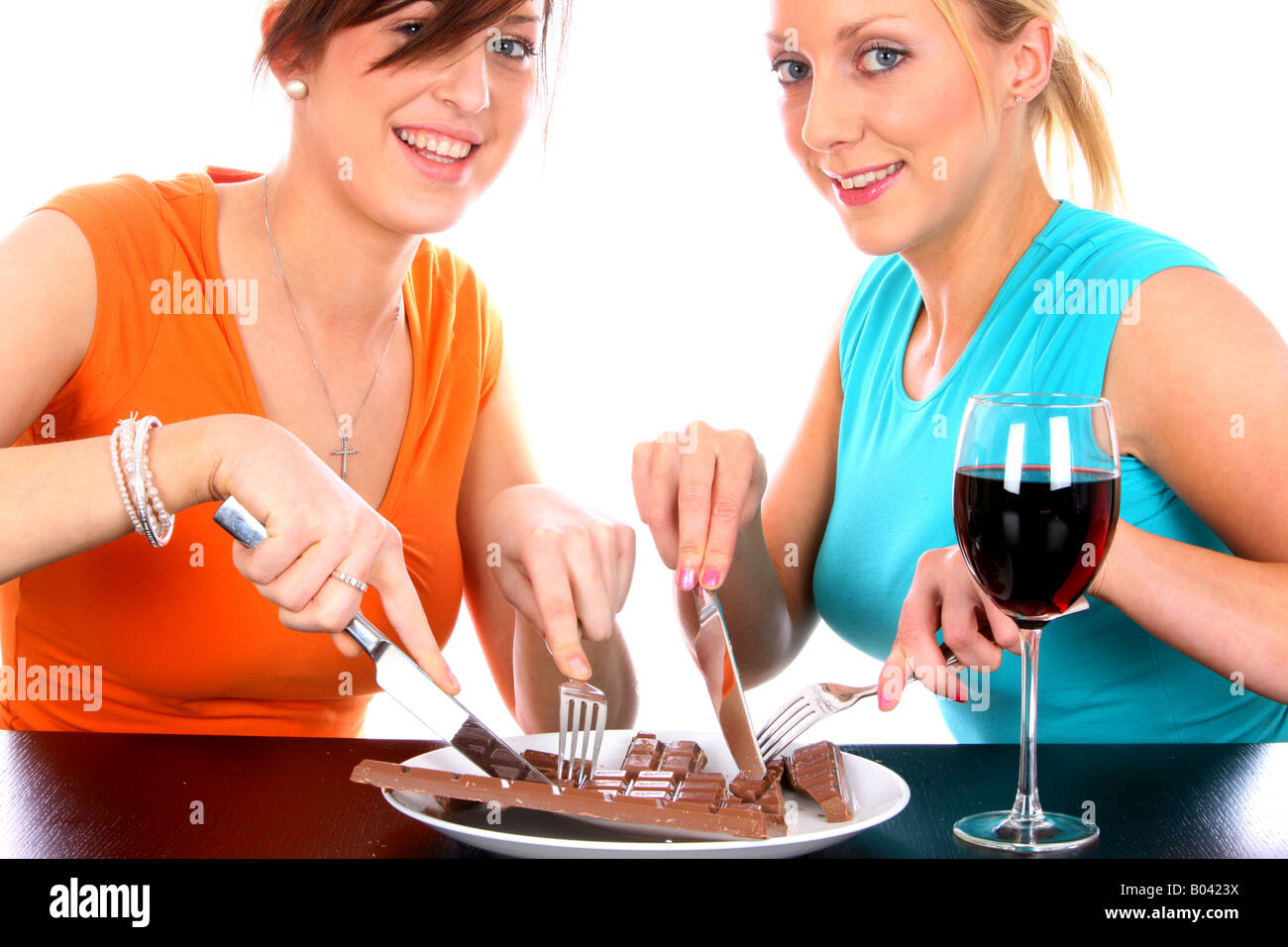 Young Women Eating Bar of Chocolate Model Released Stock Photo - Alamy