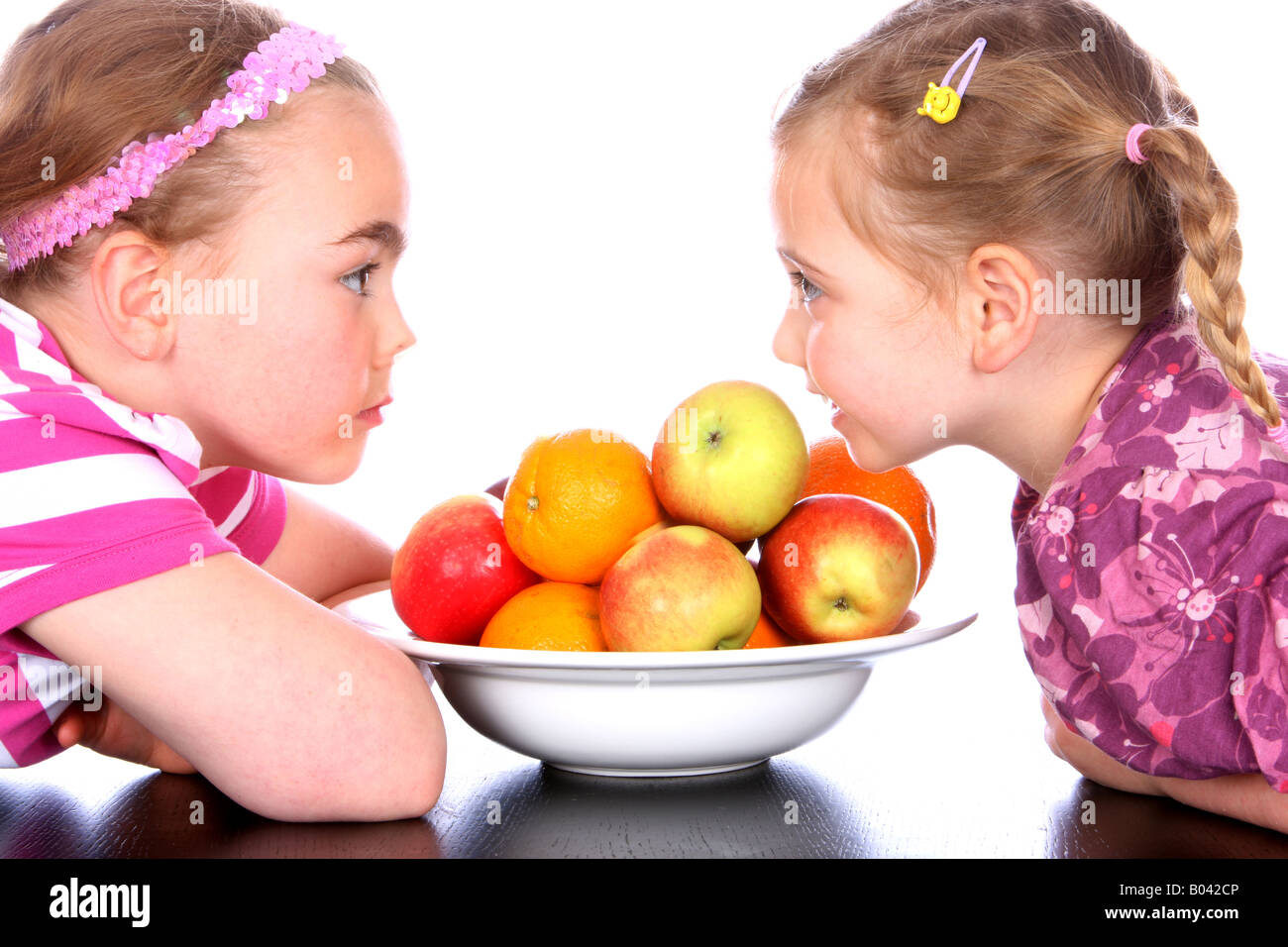 Children with Bowl of Fruit Models Released Stock Photo - Alamy