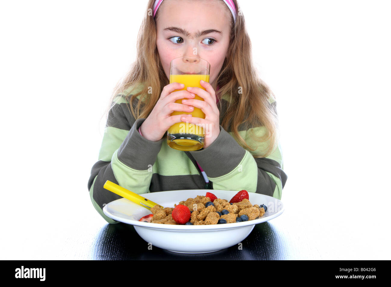 Young Girl Eating Breakfast Models Released Stock Photo - Alamy