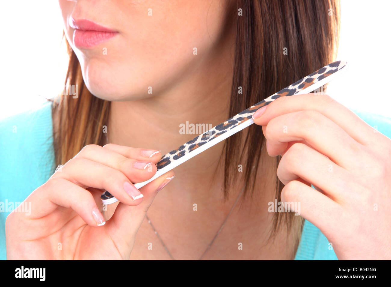 Young Woman Filing Nails Model Released Stock Photo - Alamy