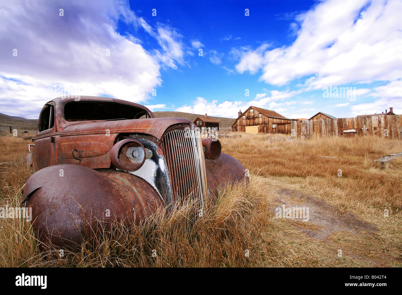 Rusted Classic Auto and Ghost Town Stock Photo - Alamy