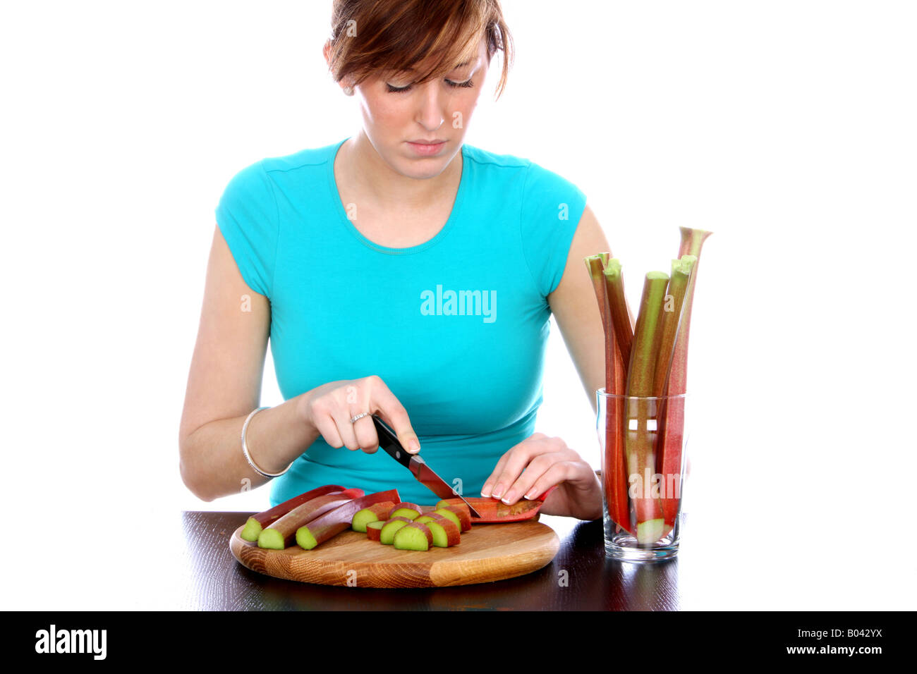 Teenage Girl Chopping Rhubarb Model Released Stock Photo - Alamy