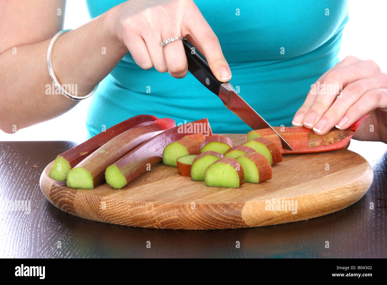 Teenage Girl Chopping Rhubarb Model Released Stock Photo - Alamy