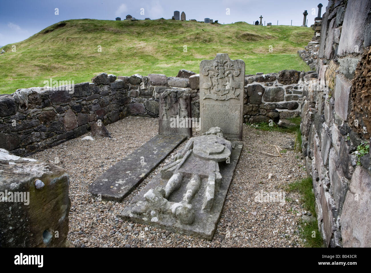 Ornate carved grave slab in the old chapel on Inchkenneth Island, Mull ...
