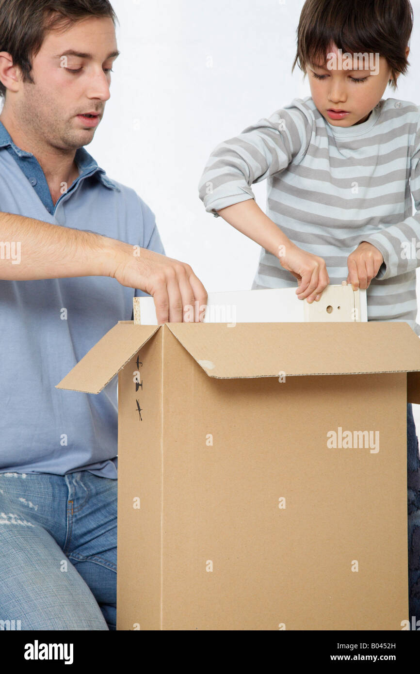 Father helping son to move out hi-res stock photography and images - Alamy