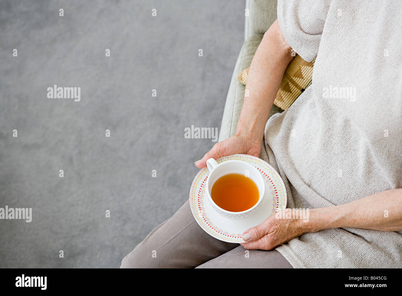 Woman with tea Stock Photo - Alamy