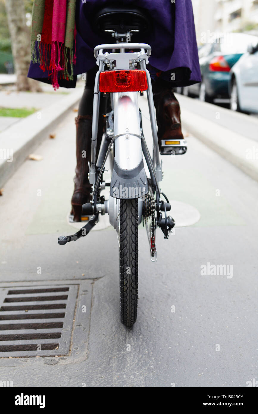 Lone female cycling hi-res stock photography and images - Alamy