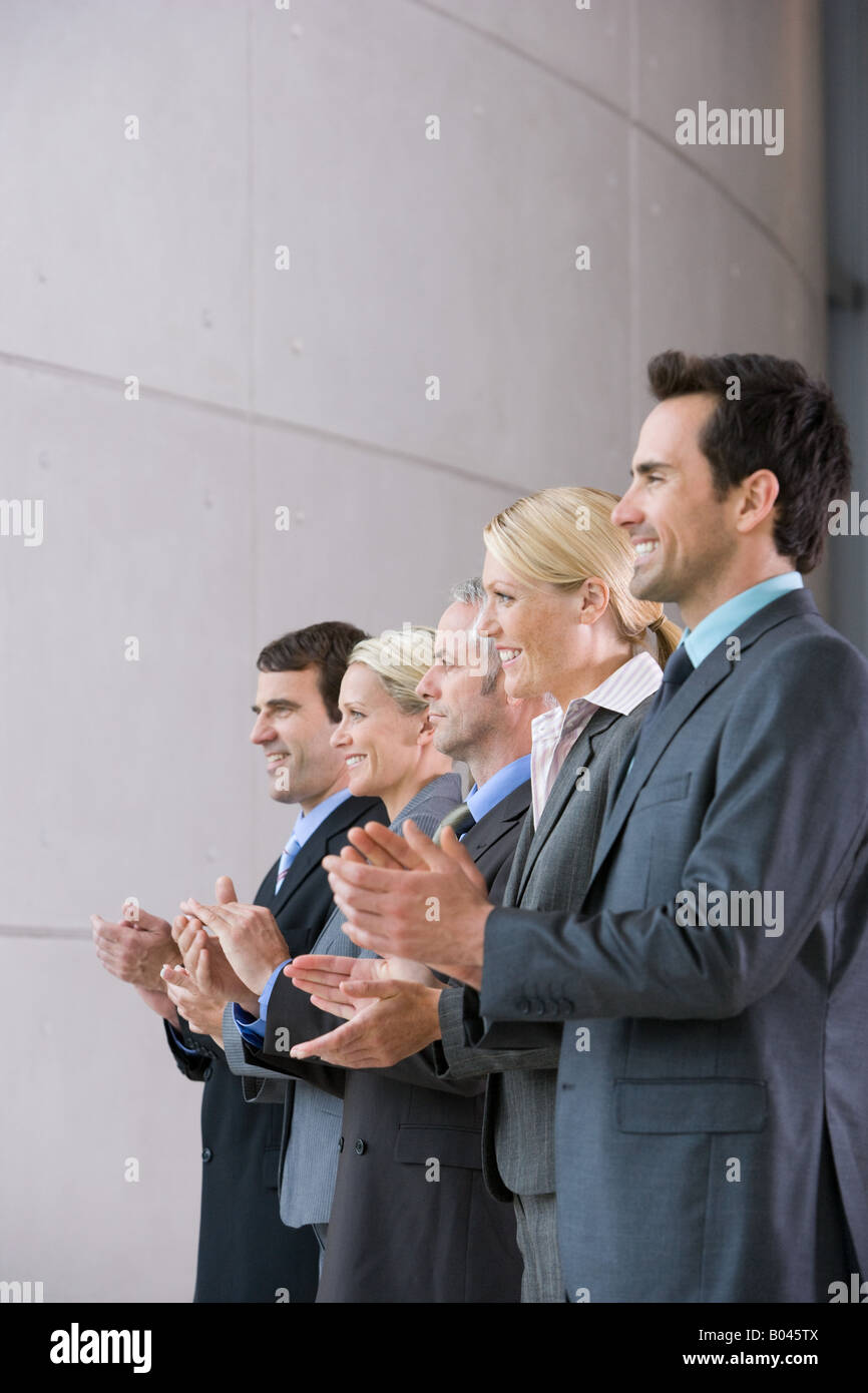 People clapping stand hi-res stock photography and images - Alamy