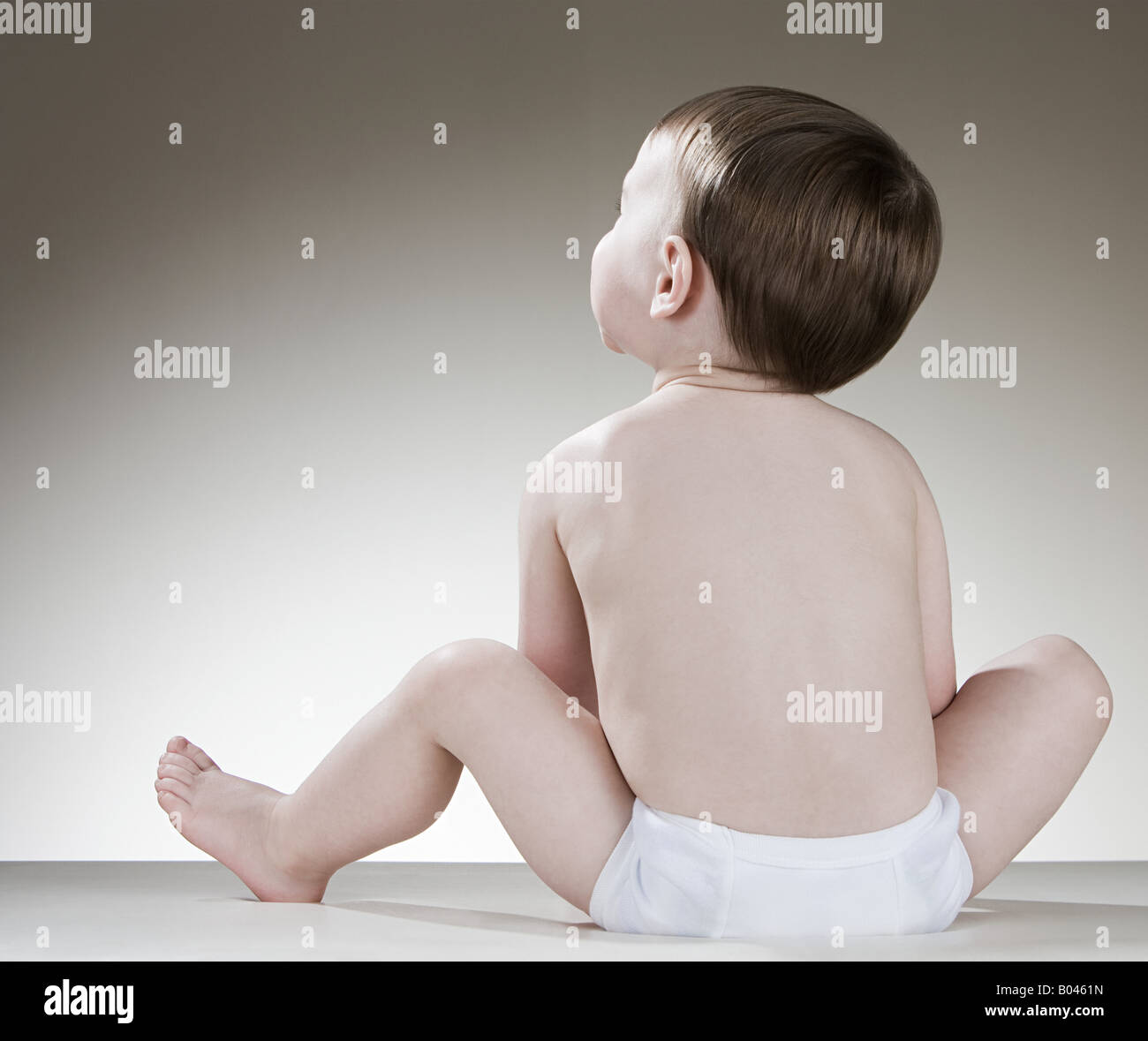 Rear view of a baby boy Stock Photo - Alamy