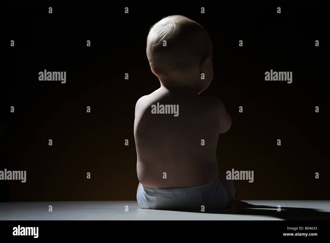 Rear view of a baby boy Stock Photo - Alamy