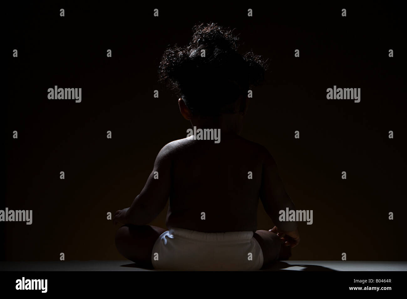 Rear view of a baby girl Stock Photo - Alamy