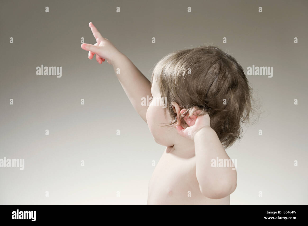 A baby girl pointing Stock Photo - Alamy