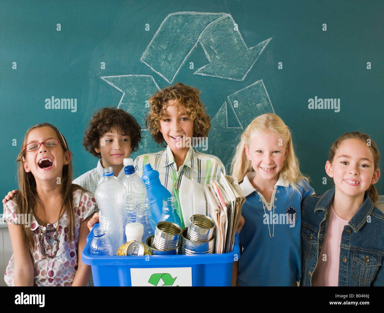 Children with a recycling bin Stock Photo - Alamy