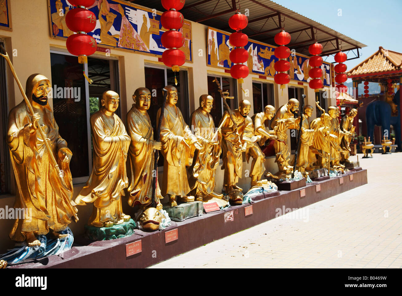 Path Lined With Golden Buddha Statues Leading to the Ten Thousand ...