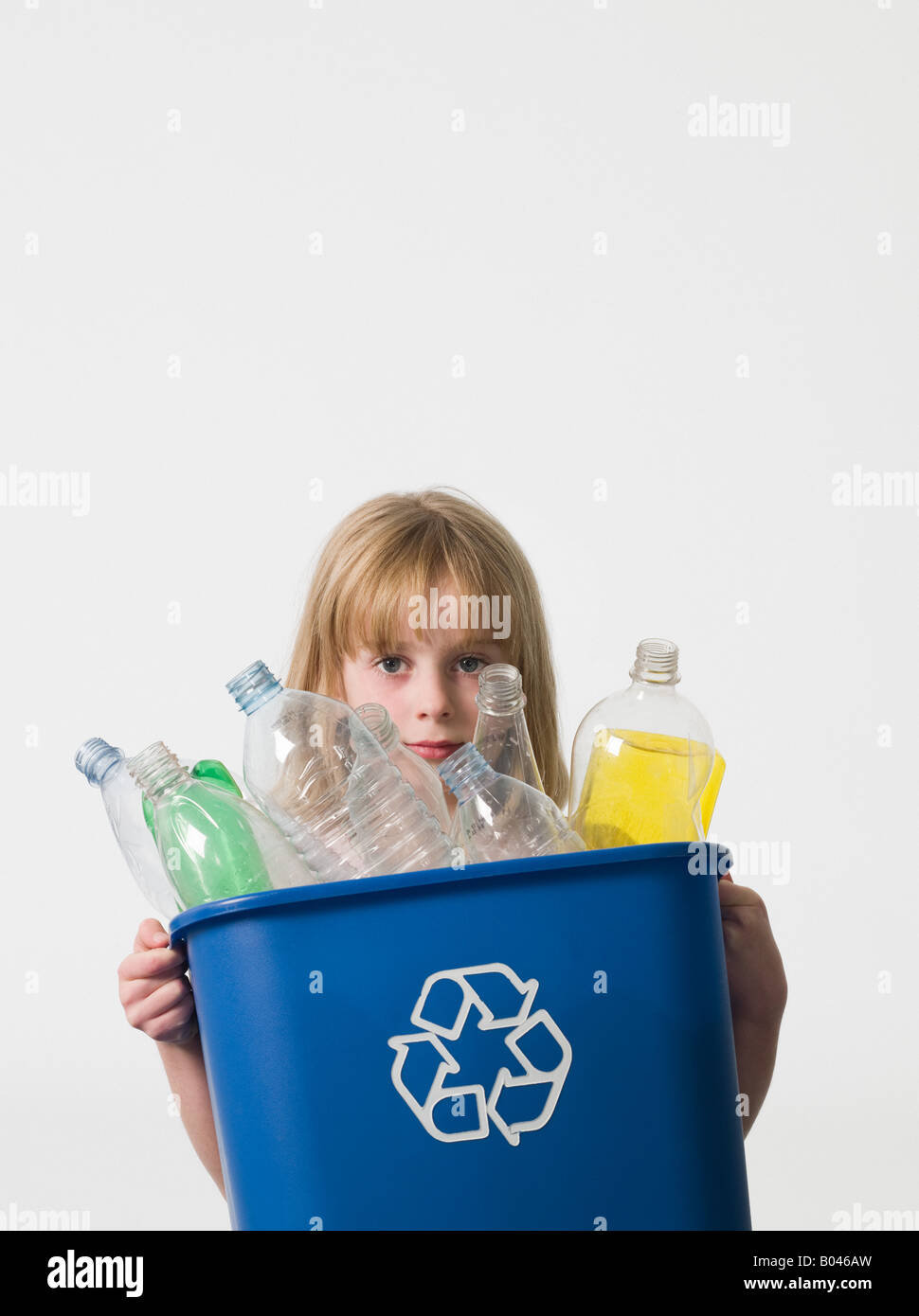 Girl recycling bottles Stock Photo - Alamy