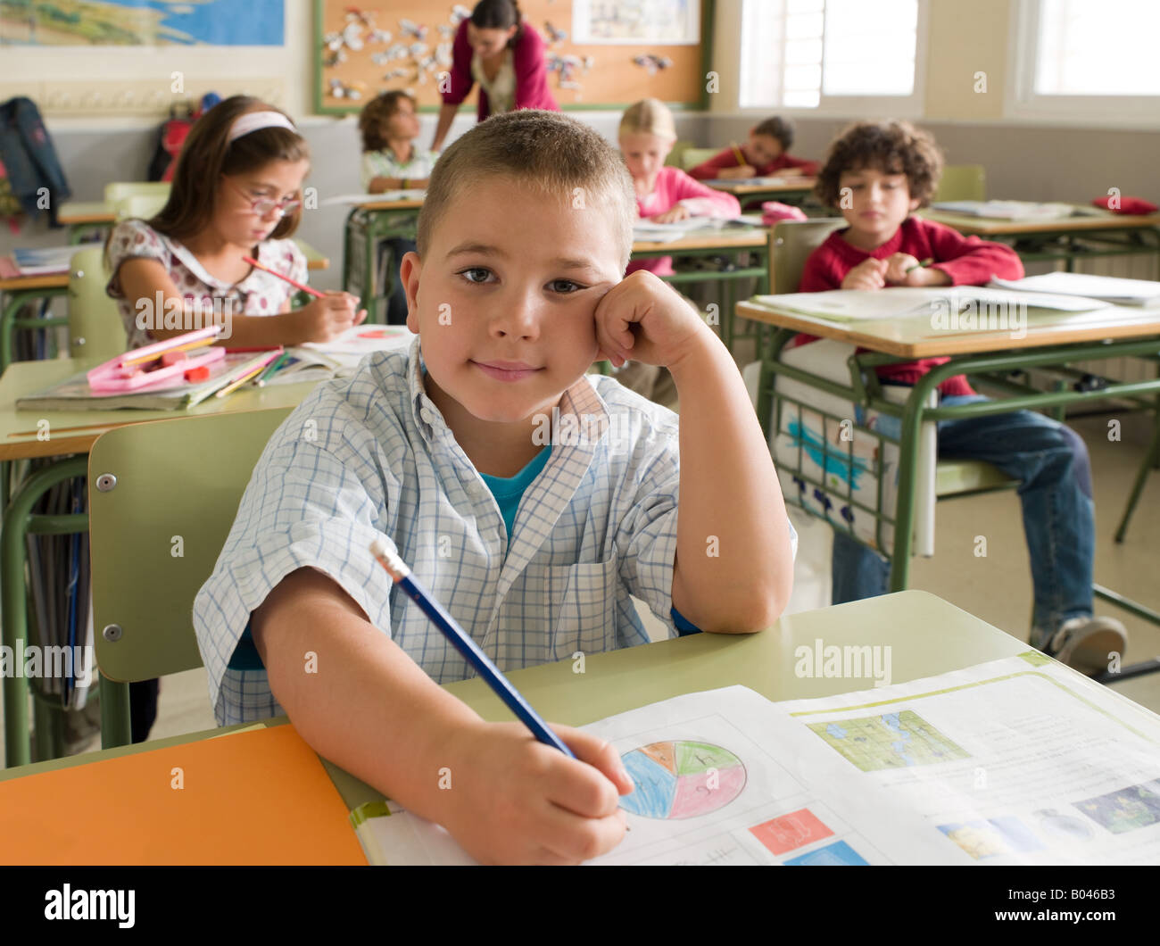 Portrait of a boy in class Stock Photo - Alamy