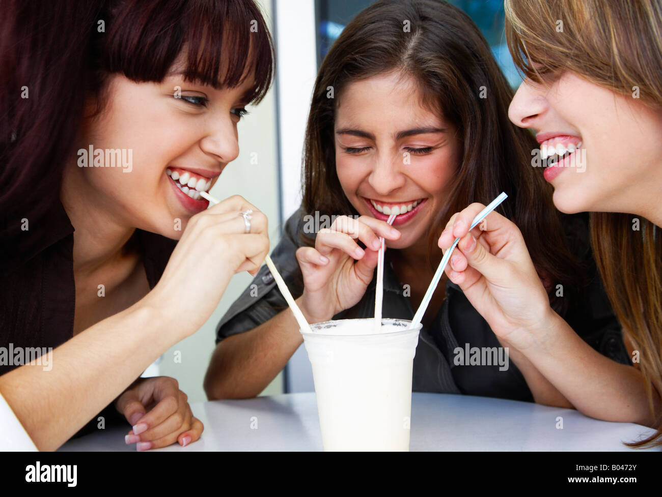 Woman Drinking Milkshake High Resolution Stock Photography and Images ...