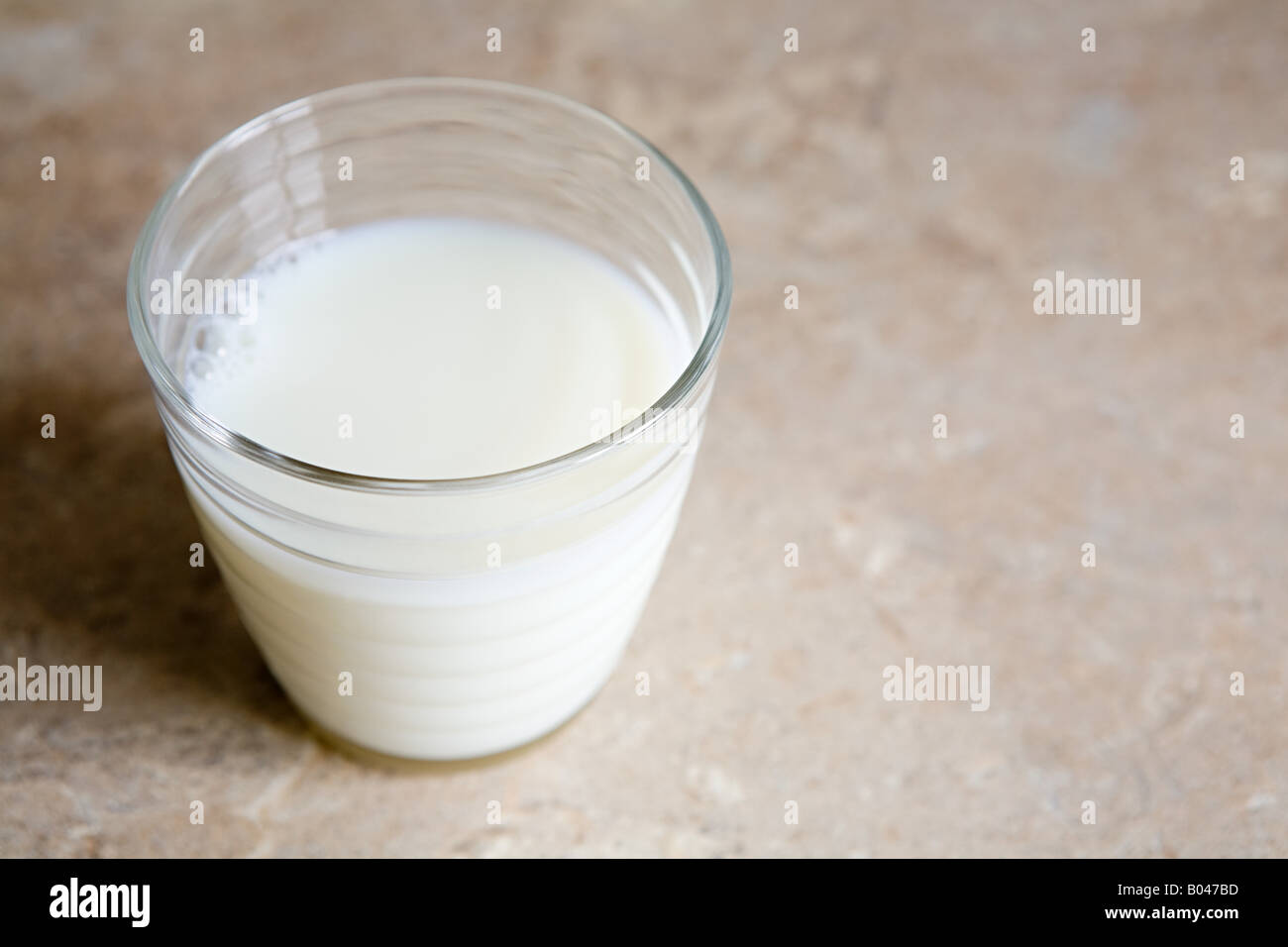 Milk in a glass Stock Photo - Alamy