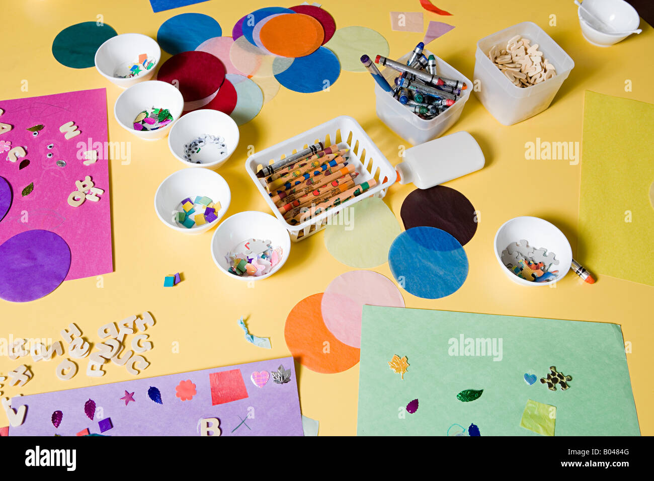 Paper and crayons on a table Stock Photo - Alamy
