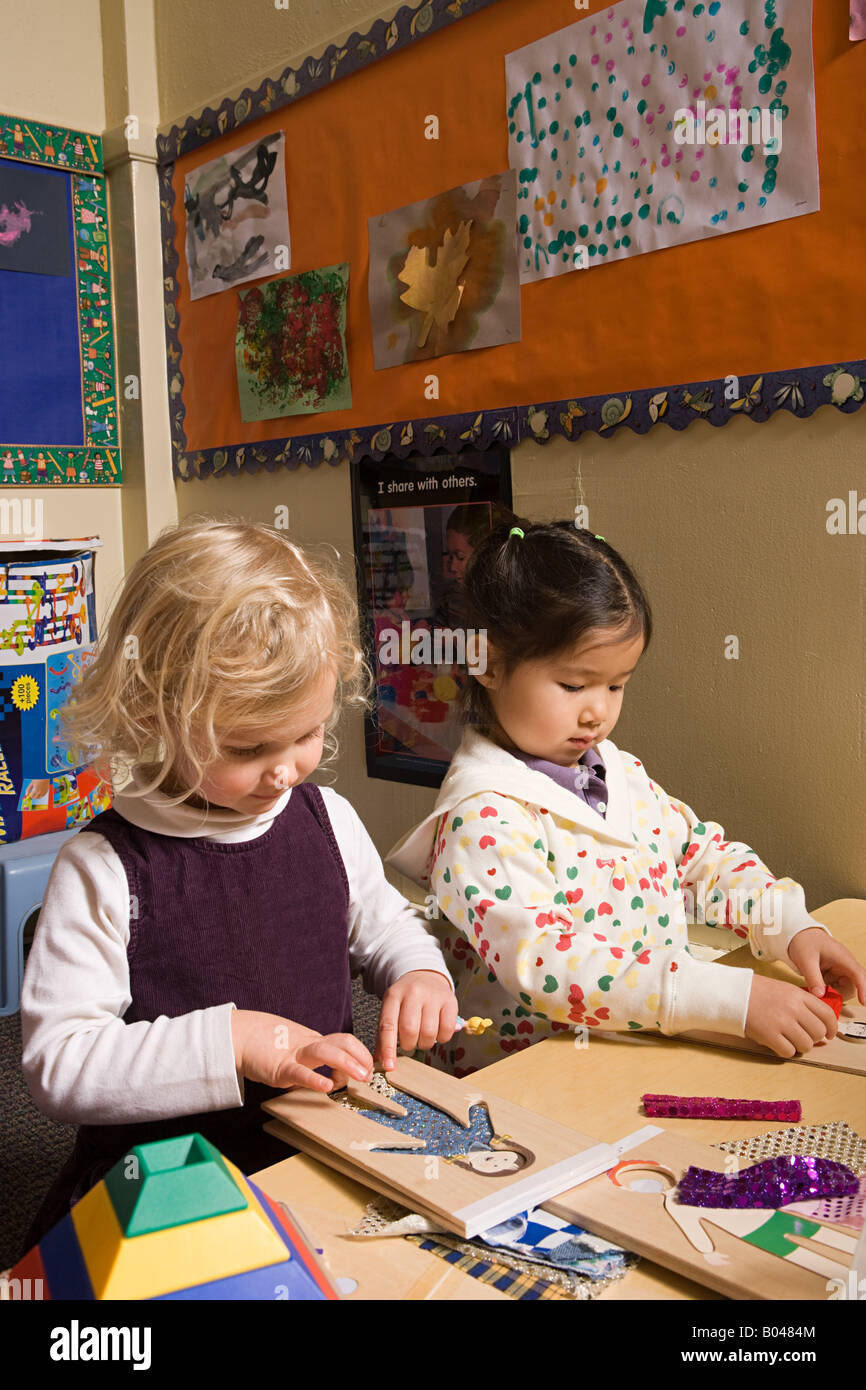 Girls in a craft lesson Stock Photo - Alamy