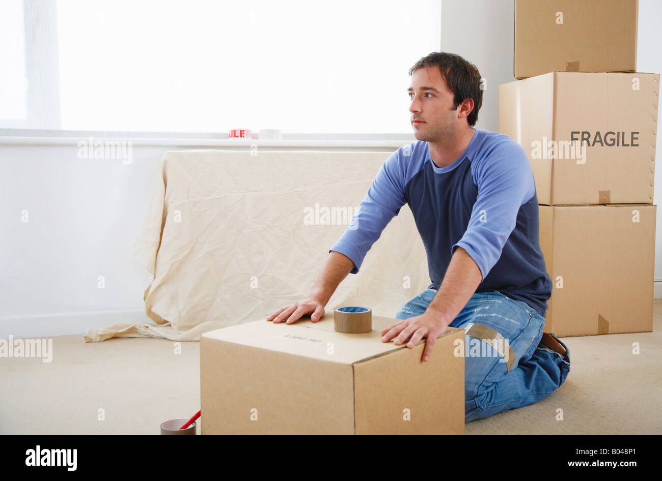 Caucasian Man Taping Cardboard Box High Resolution Stock Photography ...