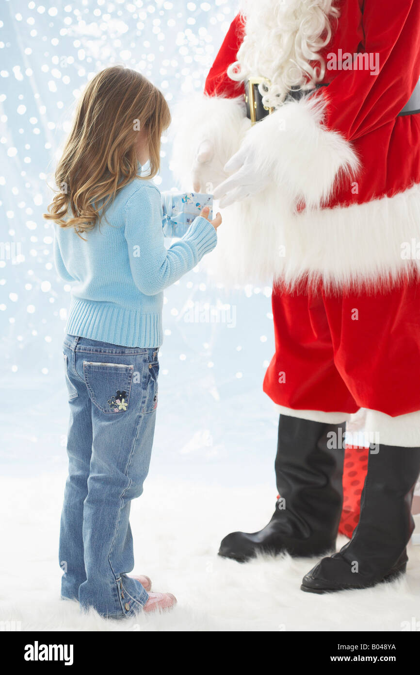 Girl 2 3 unwrapping present hi-res stock photography and images - Alamy