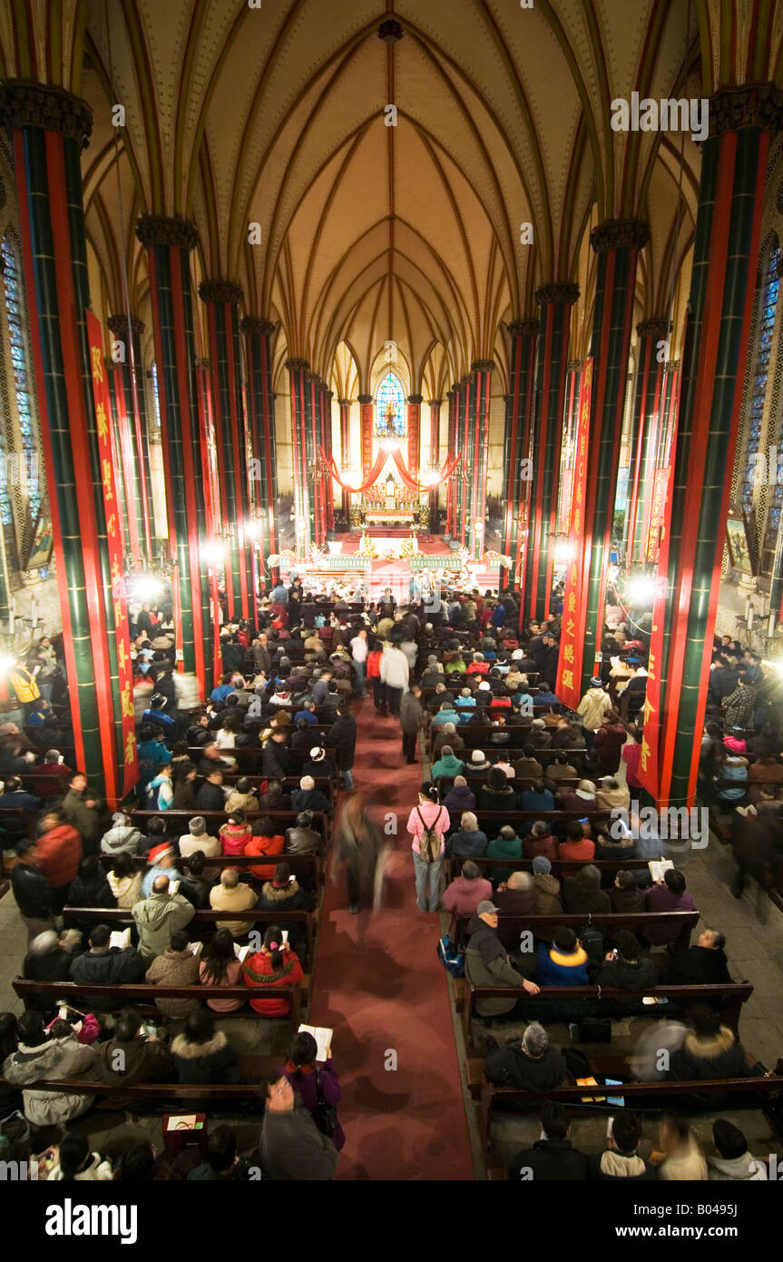 Catholic chinese praying church hi-res stock photography and images - Alamy