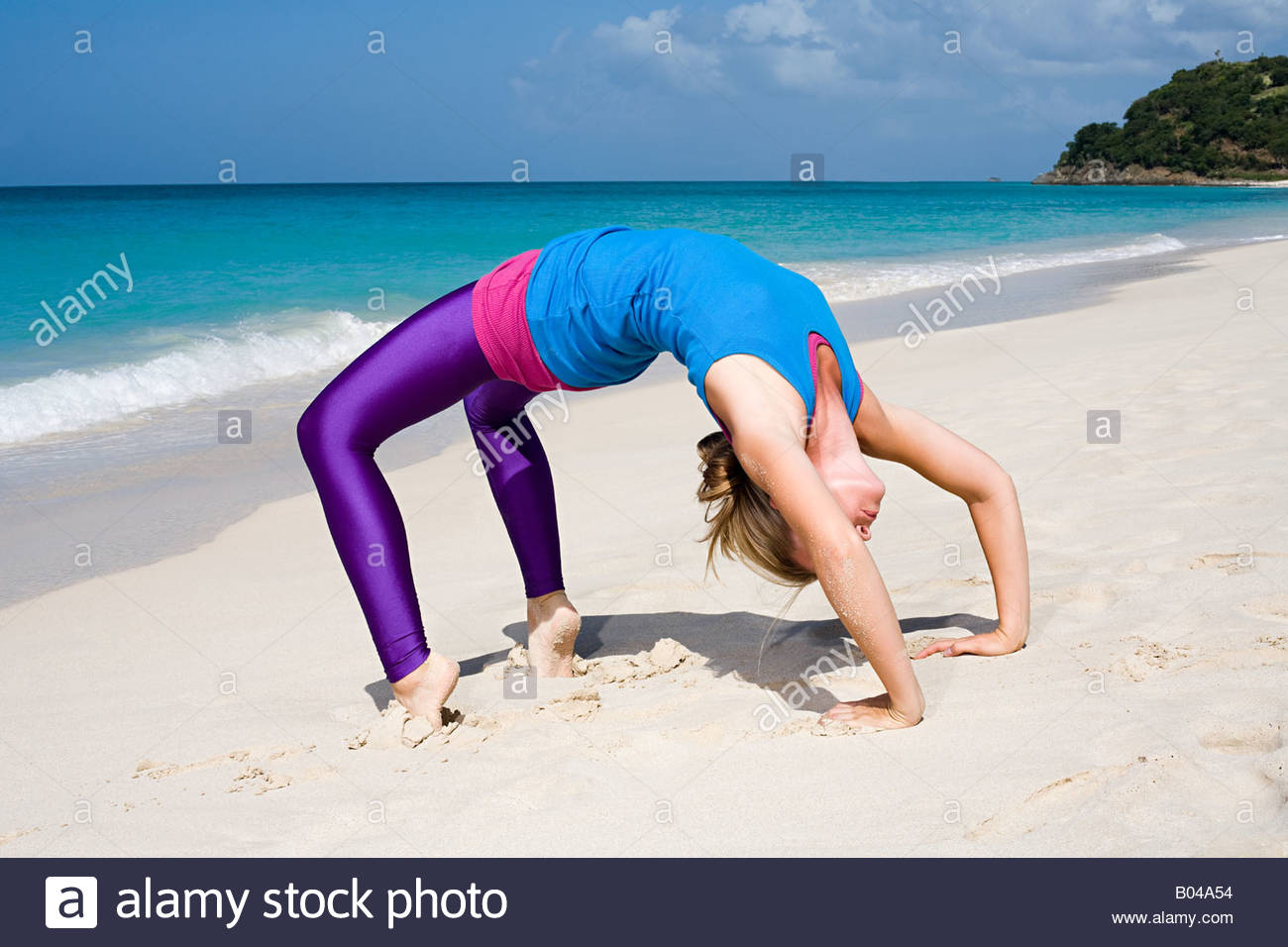 Women Yoga Bending Over Stock Photos & Women Yoga Bending Over Stock ...