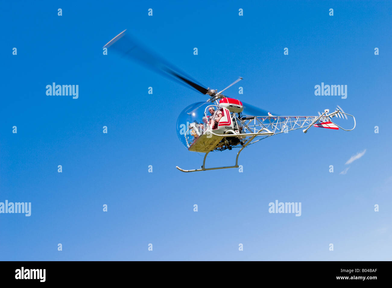 Helicopter in flight Stock Photo - Alamy