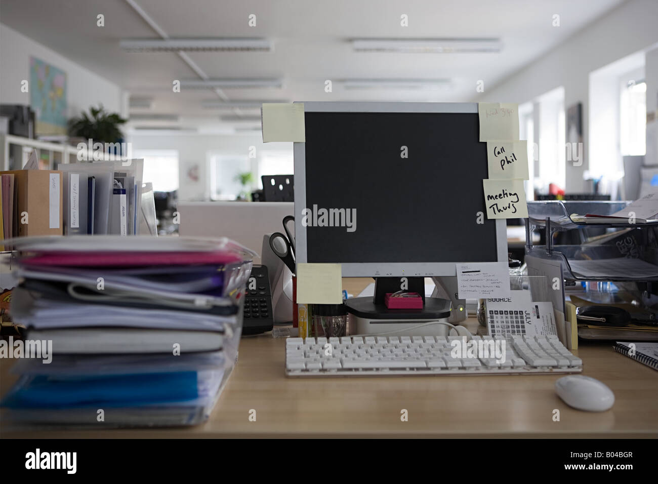 Documents and computer on desk Stock Photo - Alamy
