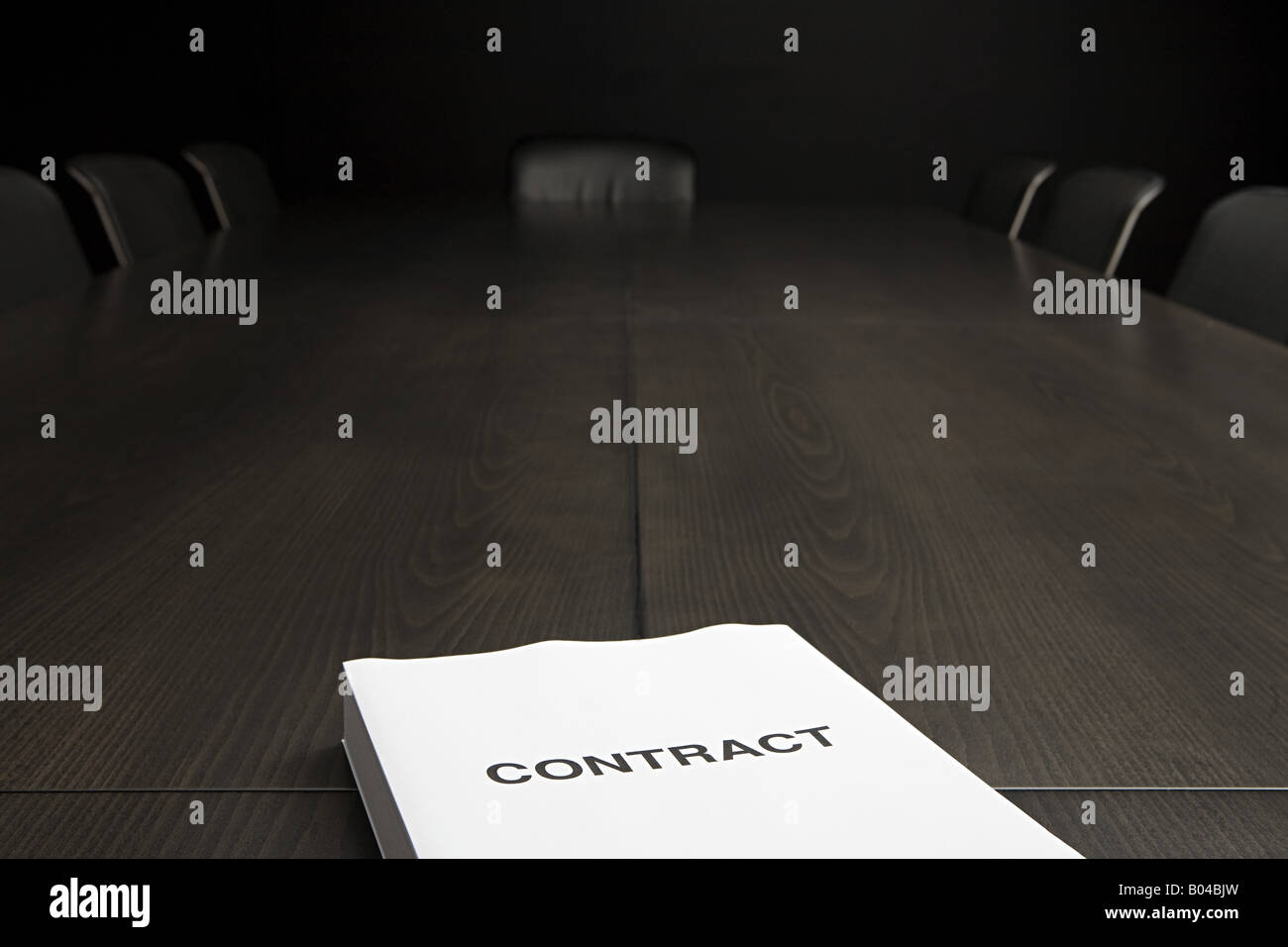 Contract on a conference table Stock Photo - Alamy