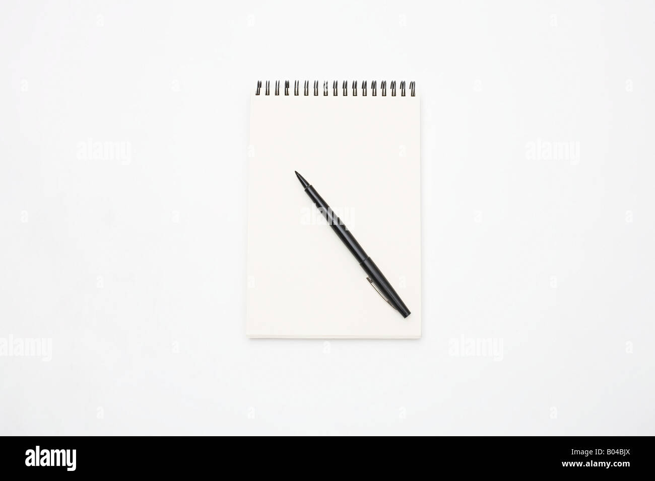 Notepad and pen Stock Photo - Alamy