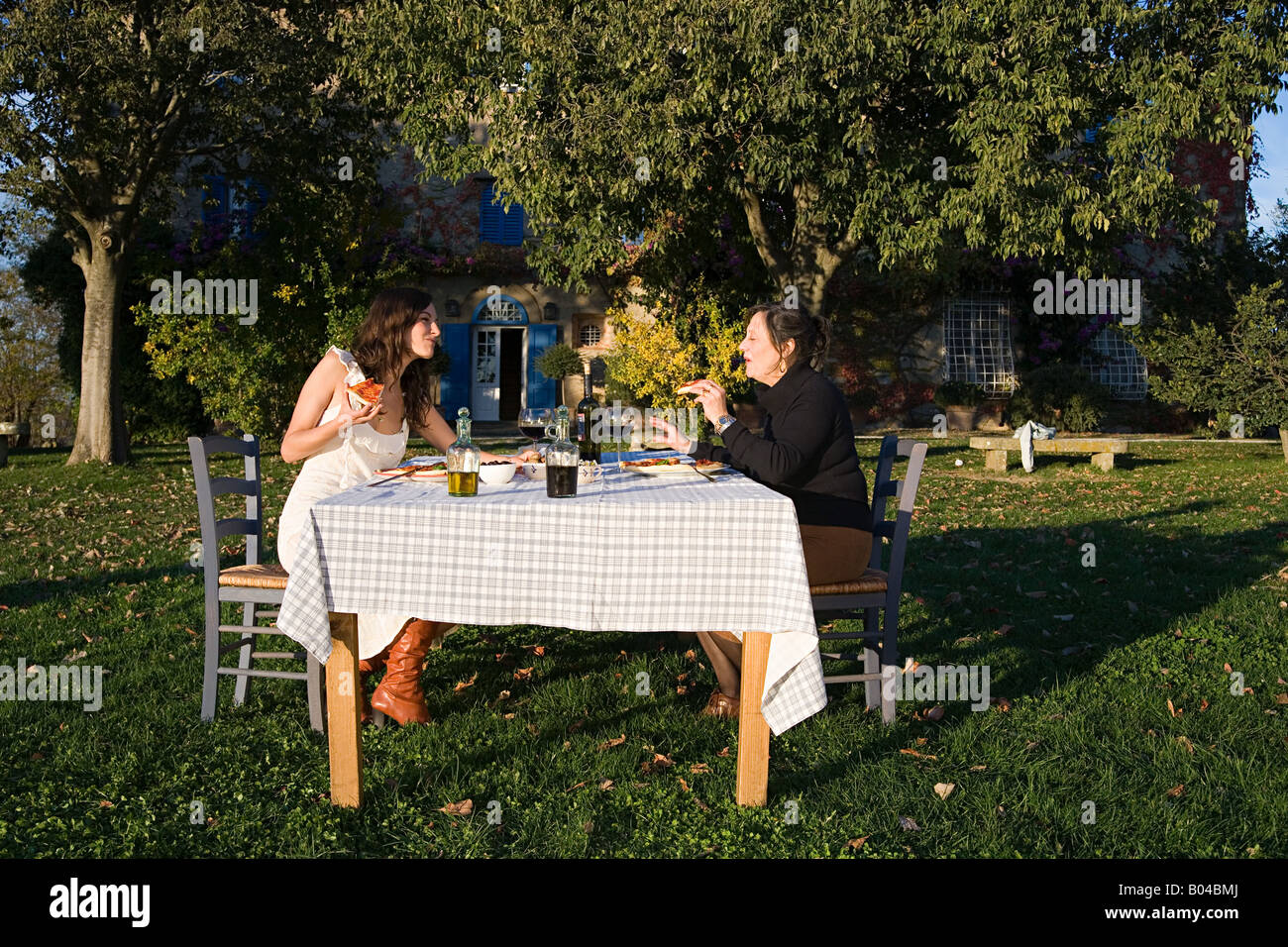 Mother daughter having food hi-res stock photography and images - Alamy