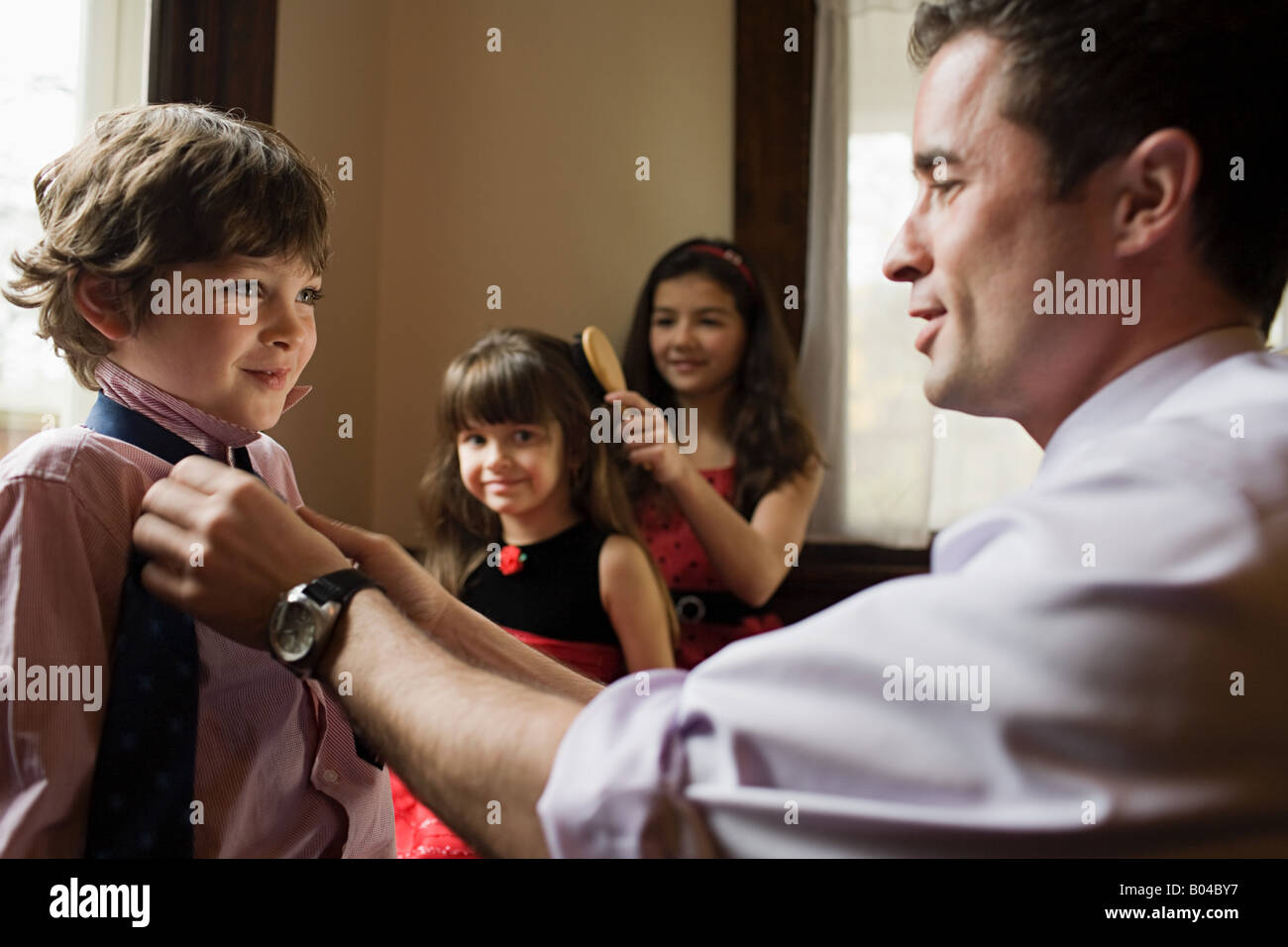 Father adjusting sons tie hi-res stock photography and images - Alamy