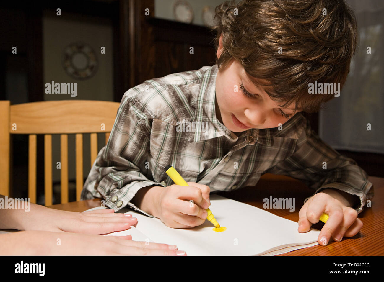 A boy drawing Stock Photo - Alamy