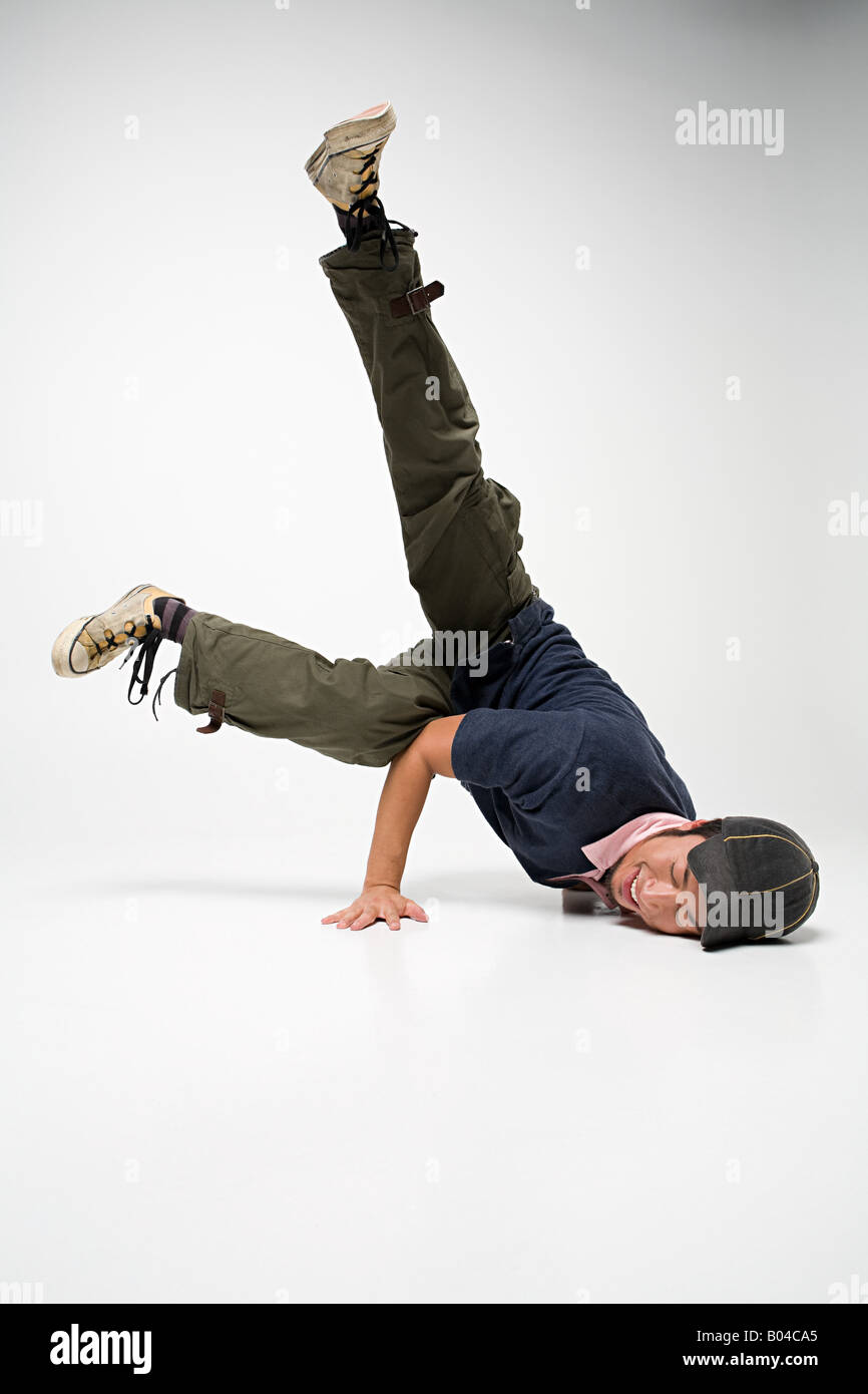 Young man breakdancing Stock Photo - Alamy
