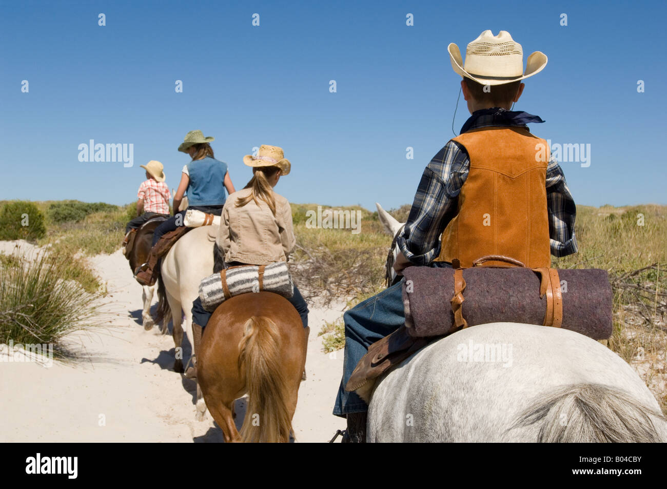 Friends riding horses Stock Photo - Alamy